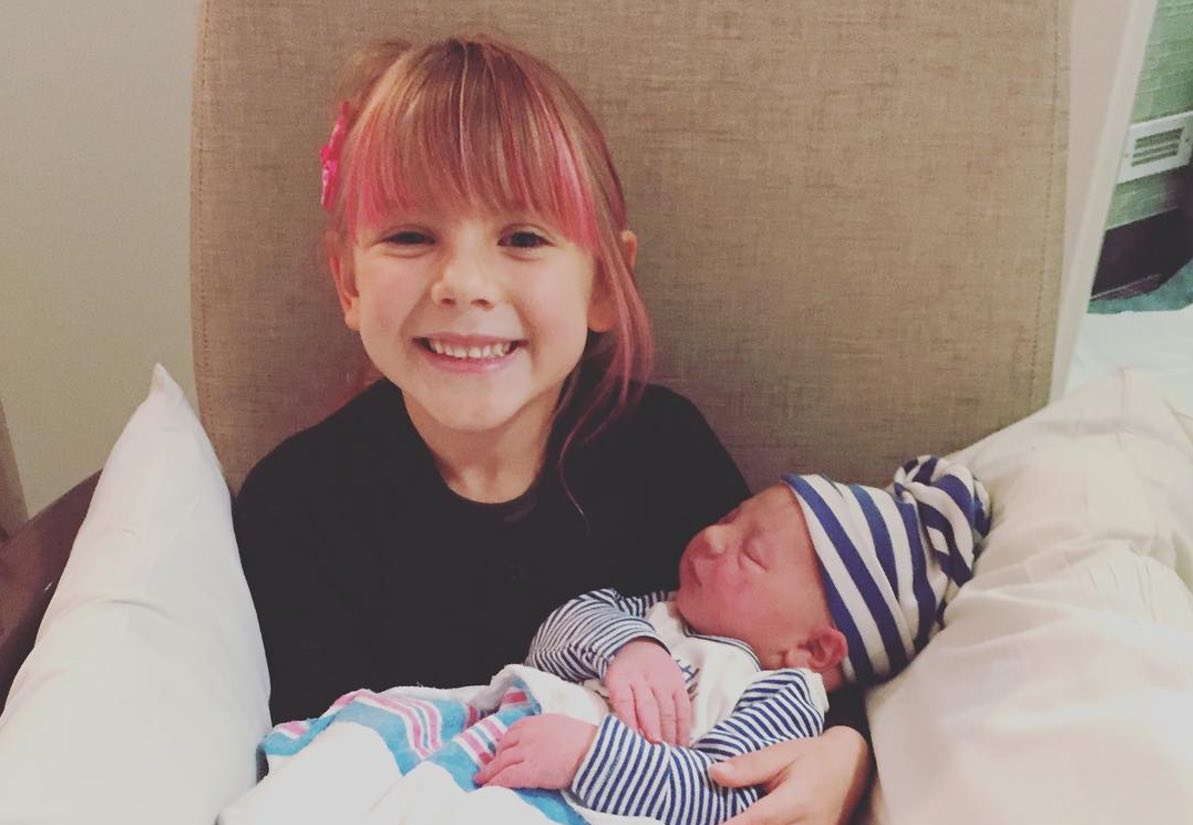 Pink Posts Adorable Photo Of Willow Holding Jameson - Canada Journal ...